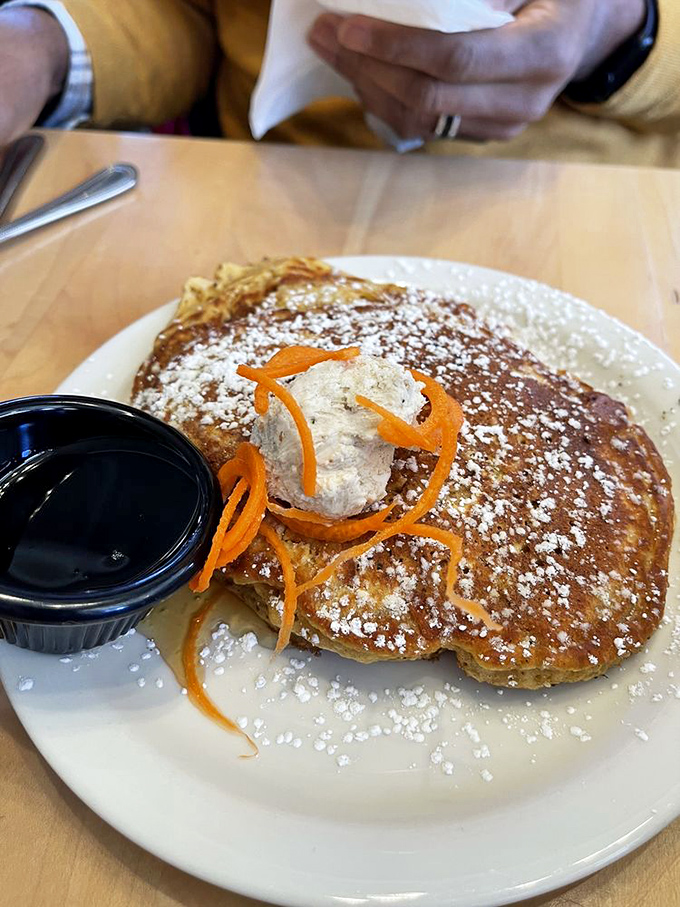 Carrot pancakes that could make you see in the dark – though you'll close your eyes in bliss with each bite of these spiced, powdered sugar-dusted beauties.