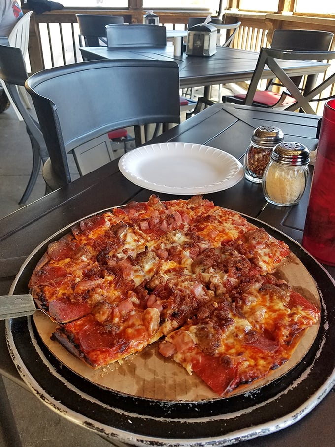 Pizza perfection doesn't need fancy wood-fired ovens or imported flour—just the right balance of cheese, meat, and a crust that means business.