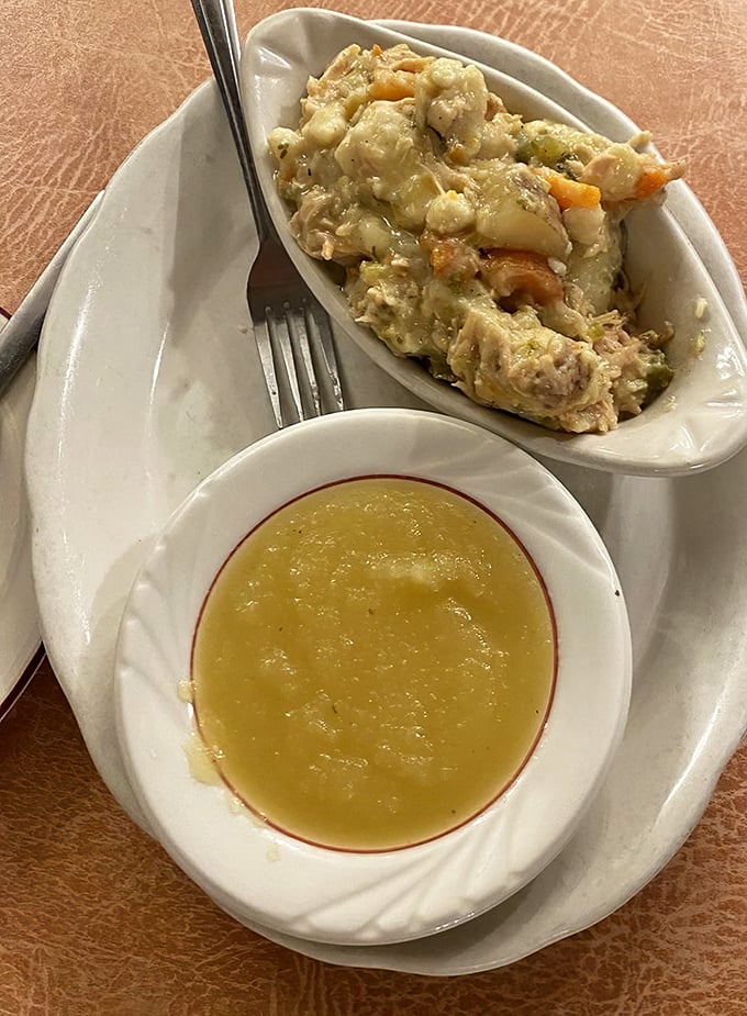Pennsylvania Dutch meets home cooking—chicken pot pie swimming in savory goodness alongside applesauce that tastes like autumn memories.