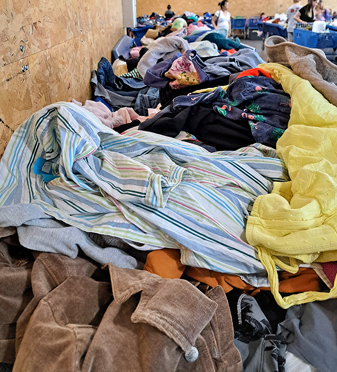 Textile treasures await the patient hunter—that perfect striped shirt or cozy yellow sweater might be hiding just beneath the surface.