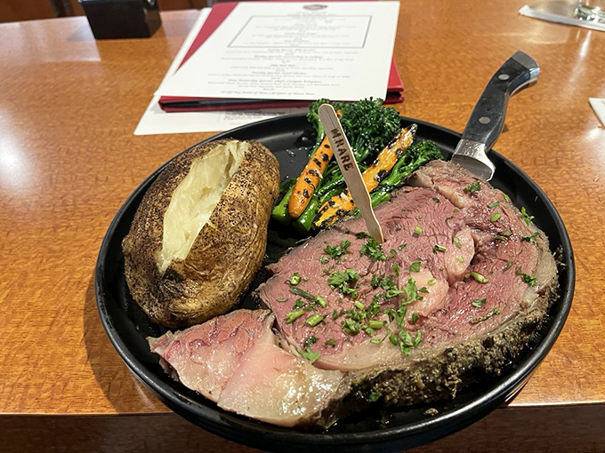 Prime rib that doesn't need a filter or fancy lighting—just your undivided attention. The loaded baked potato is no mere side character.