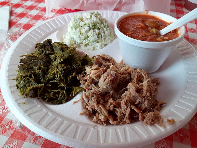 This isn't just pulled pork – it's Eastern Carolina tradition served with collards and Brunswick stew that would make your grandmother nod in approval.