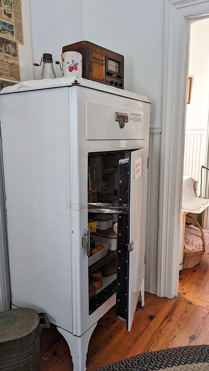 This isn't your stainless steel smart fridge – it's the genuine article from when "icebox" wasn't a retro term and cooling technology was revolutionary.