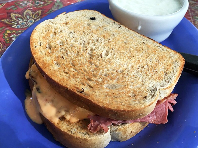 The Reuben sandwich proves that Over Easy doesn't just do breakfast—it creates midday masterpieces that would make any New York deli nod in respect.