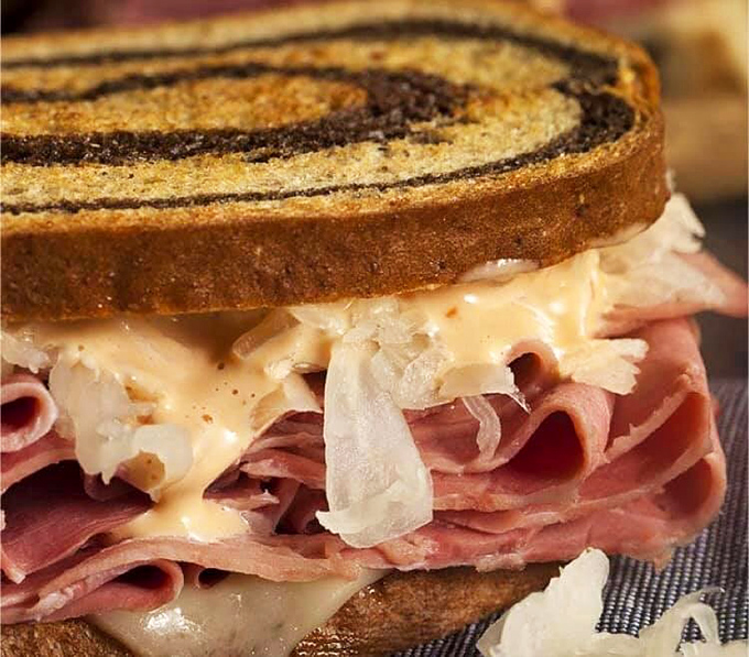 The Reuben at Brady's doesn't just stack meat and sauerkraut—it architects them into a masterpiece of texture and flavor on marble rye.