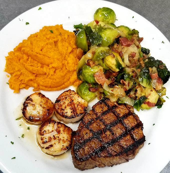 Perfectly cross-hatched grill marks on this steak aren't just for show—they're flavor geography mapping out your next several moments of bliss. 