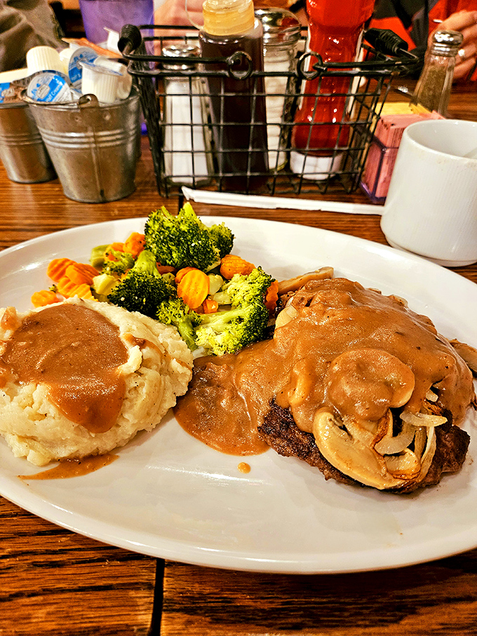 This isn't just comfort food; it's therapy on a plate. Mashed potatoes, gravy, and veggies that didn't come from a freezer bag. Grandma would approve.