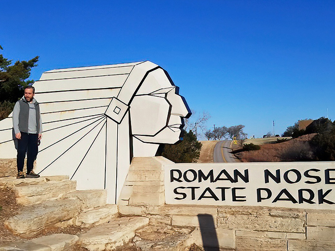 Roman Nose State Park's iconic entrance stands as a gateway to affordable outdoor adventures—nature's entertainment complex with no subscription fees required.