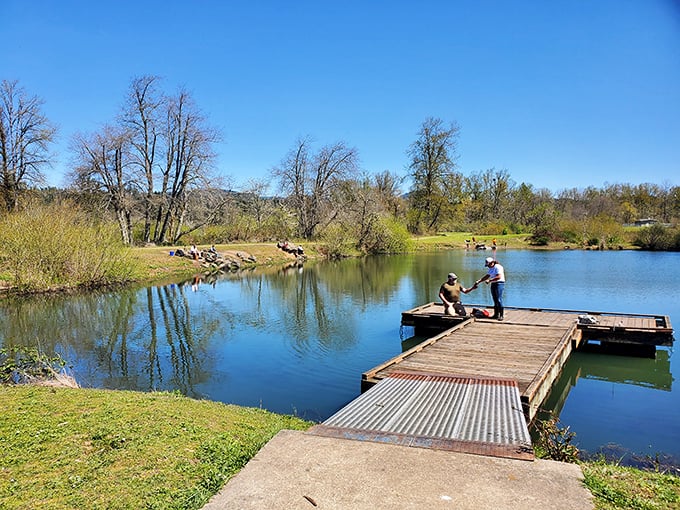 Fishing from the dock at Row River Nature Park—where catching nothing still feels like winning at life.