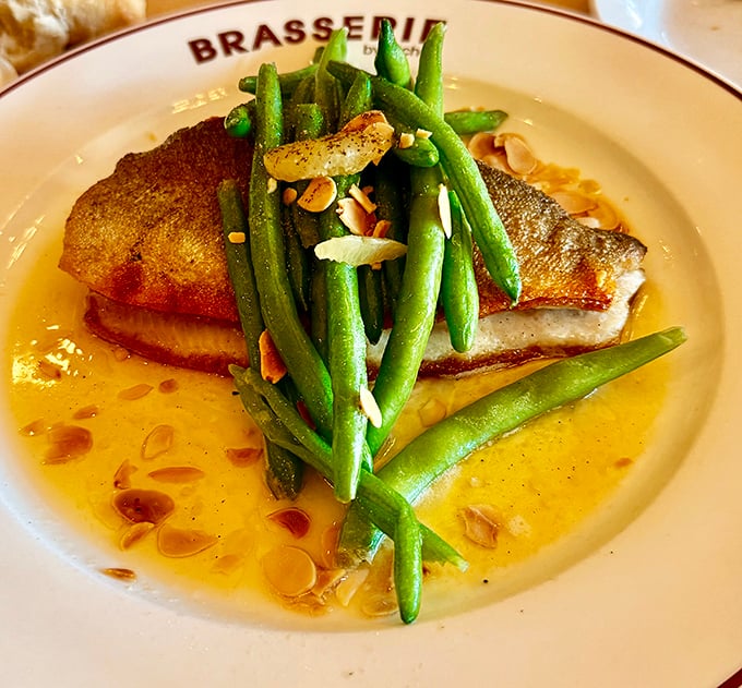 Crispy-skinned sea bass lounging in buttery sauce with green beans standing at attention—the French sure know how to make fish fabulous.