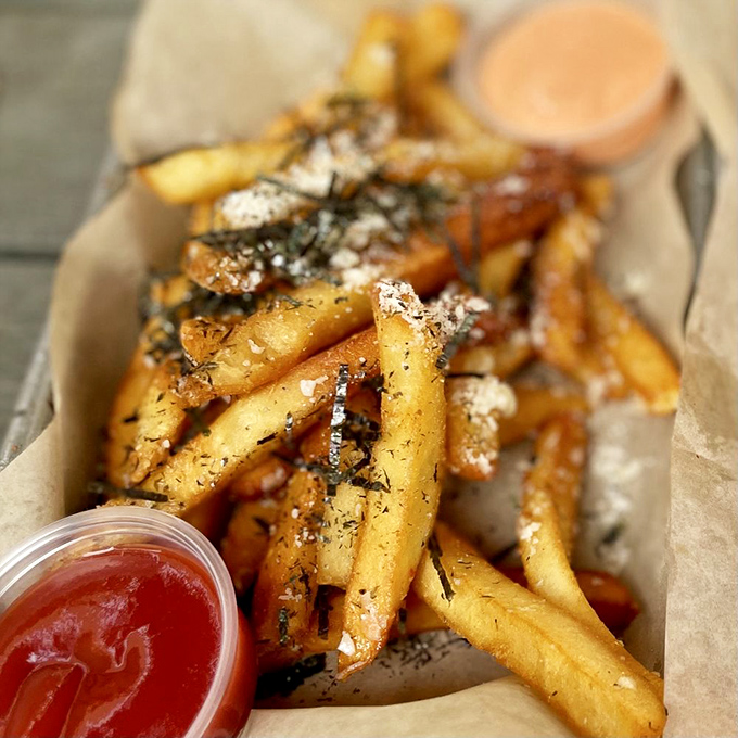 These aren't your average fries—they're wearing formal attire. Dressed in nori flakes and parmesan, they've graduated from side dish to main event.