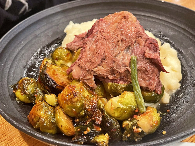 This short rib pot roast doesn't just fall off the bone—it practically leaps onto your fork, bringing Brussels sprouts along for the delicious ride. 