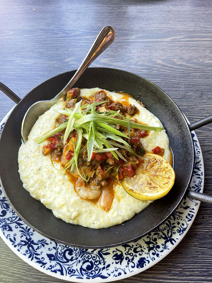 These shrimp and grits tell a more authentic Southern story than any Civil War reenactment ever could.