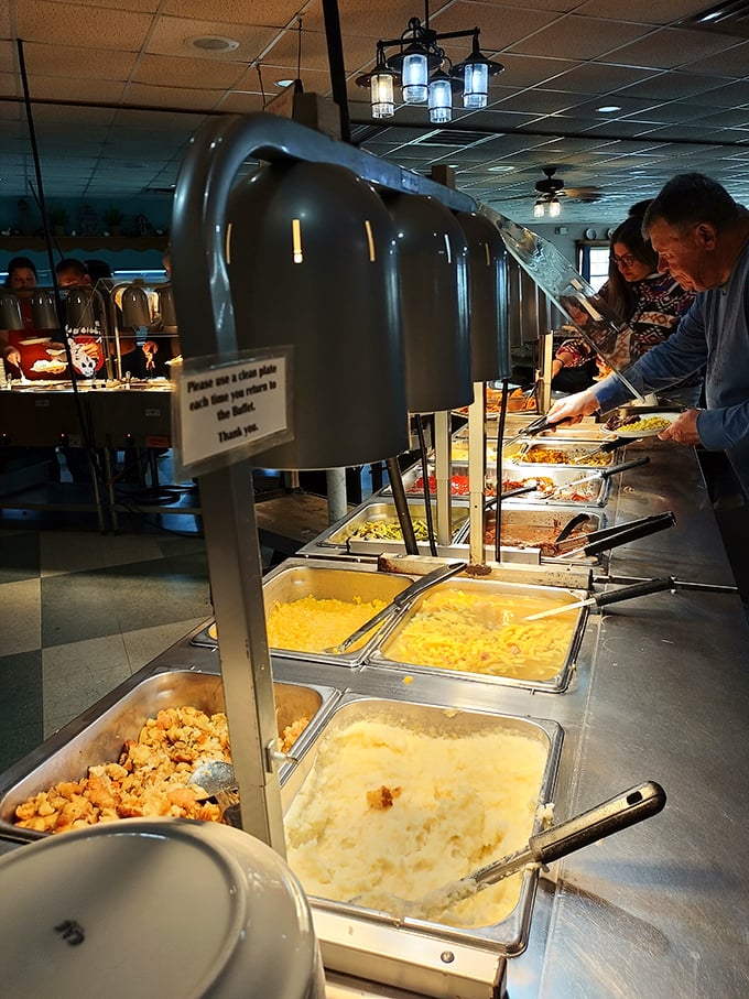 The buffet line at Mrs. Yoder's isn't just a meal—it's a parade of Midwestern comfort classics where mashed potatoes and corn stand proudly at attention.
