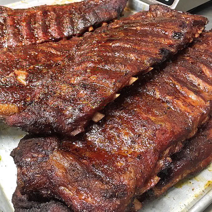 These ribs have the perfect bark—not the kind that grows on trees, but the kind that makes barbecue aficionados weak at the knees.