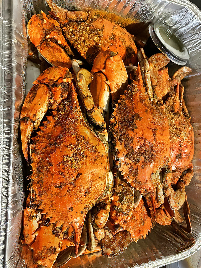 These seasoned blue crabs aren't just dinner; they're an interactive experience that rewards patience with sweet, succulent meat.