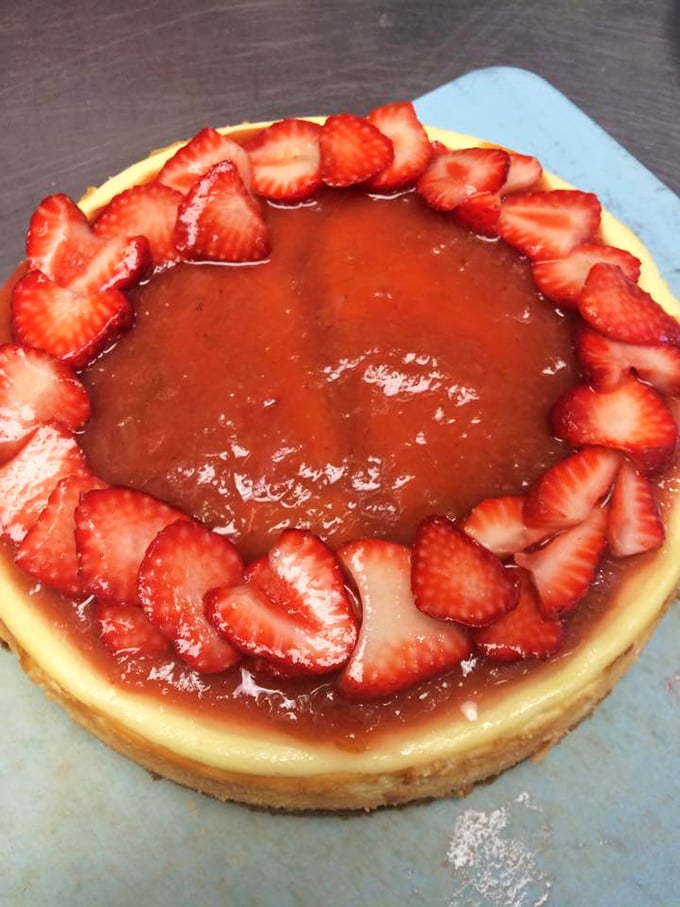 This strawberry cheesecake isn't just Instagram-worthy—it's a summer romance on a plate, the kind you'll reminisce about in January.