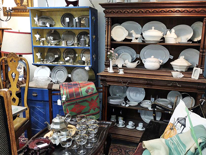 White china displayed on dark wood hutches—the antique equivalent of dressing formal for dinner every single night.