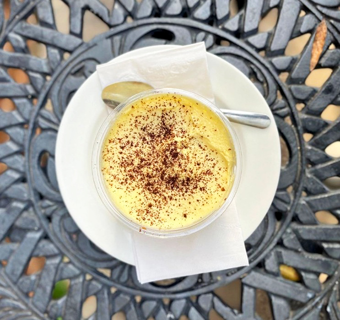 Sunshine in a cup! This tiramisu's perfect dusting of cocoa is like the freckles on a summer day—charming and just right.
