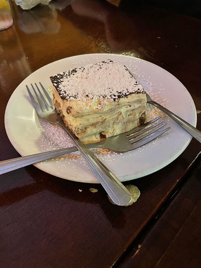 Tiramisu so perfectly dusted with cocoa powder it looks like a Renaissance painting—one that you'll destroy with gleeful abandon.