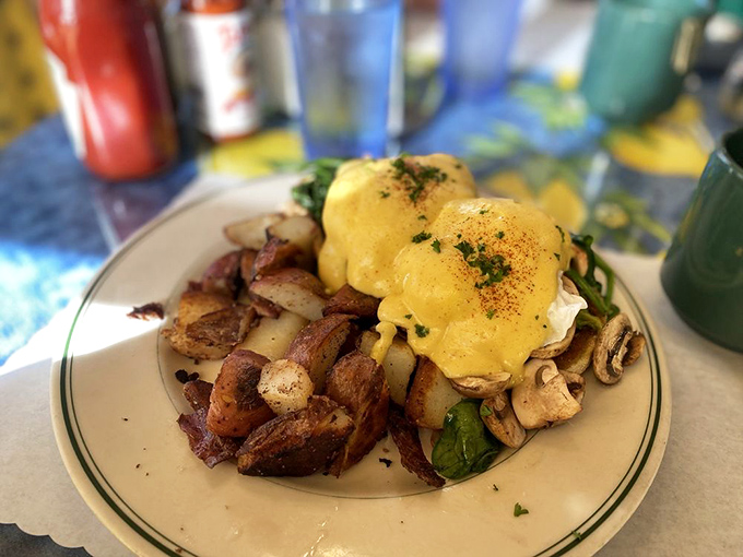 Benedict Arnold may have been a traitor, but these Benedicts are loyal to flavor. Golden hollandaise cascades over perfectly poached eggs like California sunshine.
