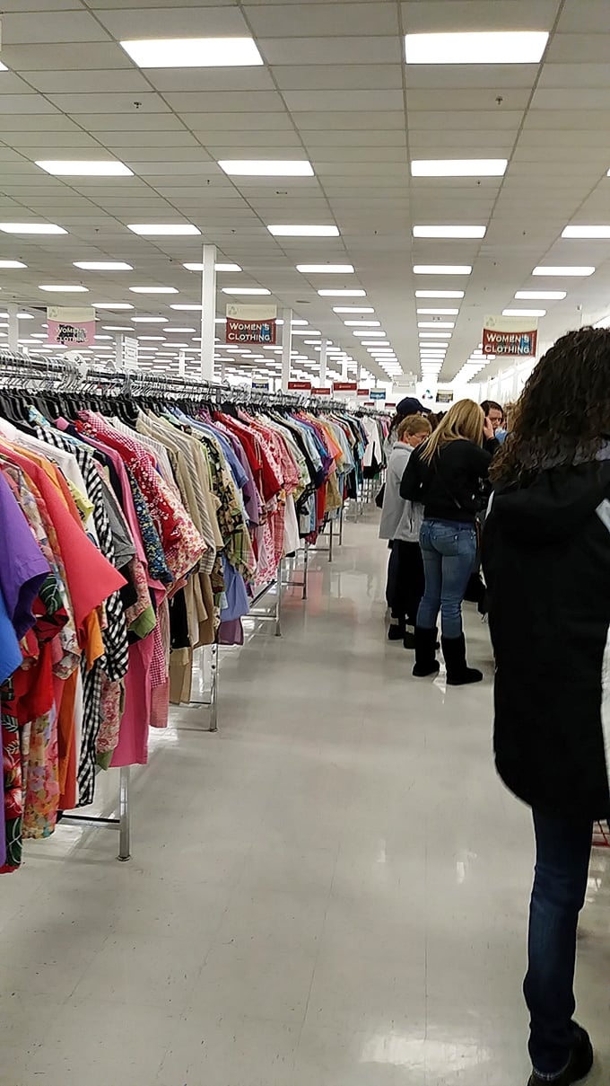 The thrill of the hunt in action—shoppers navigate the well-organized aisles like seasoned explorers on a quest for hidden gems.