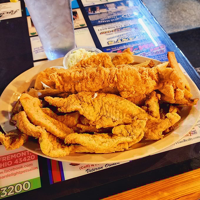 Walleye so perfectly fried it makes you wonder if there's a secret handshake to get the recipe. The coleslaw provides the perfect cool counterpoint.