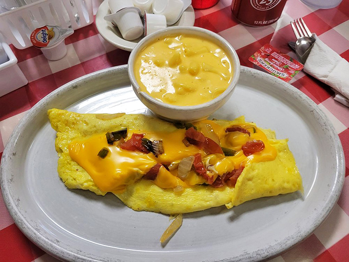 This Western omelet doesn't just bring the cheese—it delivers a sunshine-yellow package of morning joy with peppers and onions playing supporting roles.