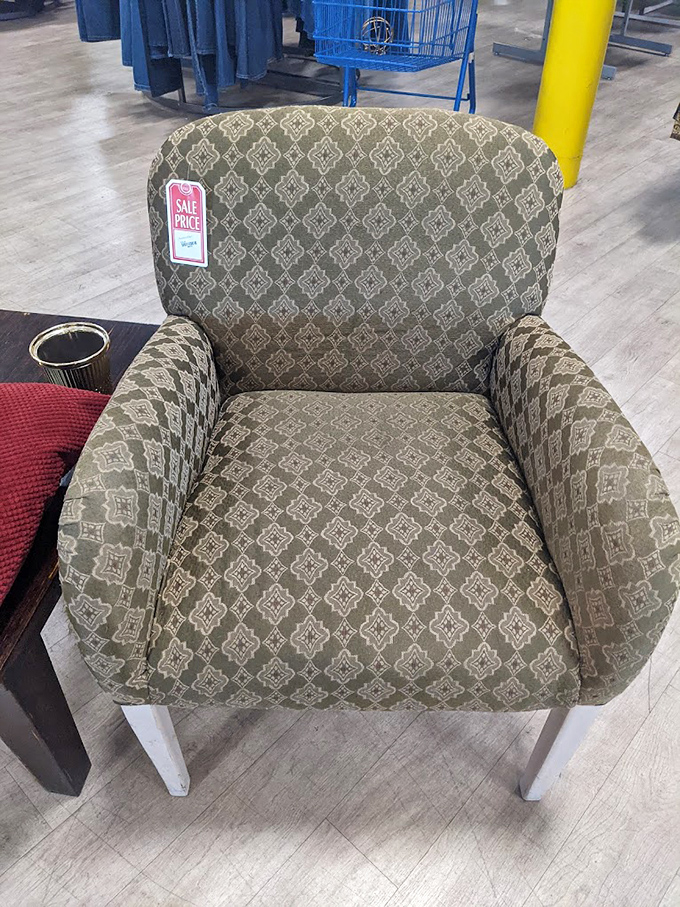 That patterned armchair isn't just seating—it's a time machine to someone's 1990s living room, now available for your nostalgic sitting pleasure.