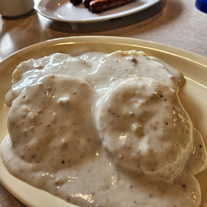 These biscuits and gravy aren't just a side dish—they're the main event. Comfort food that hugs your soul from the inside.