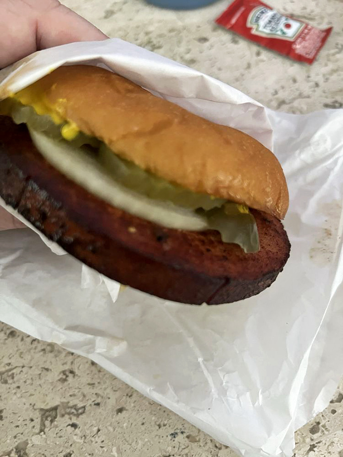 The bologna sandwich that launched a thousand road trips—thick-cut, crispy-edged, and making you wonder why you ever stopped eating this childhood classic.