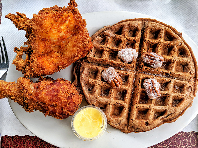 The holy matrimony of crispy fried chicken and pecan waffle—a relationship more harmonious than most Hollywood marriages.