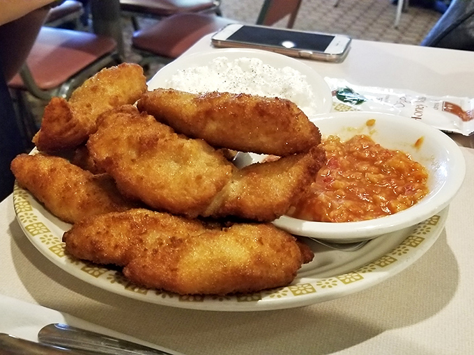 These chicken tenders could convert even the most sophisticated food snob. Crispy armor protecting juicy meat—a textbook example of doing simple things extraordinarily well.