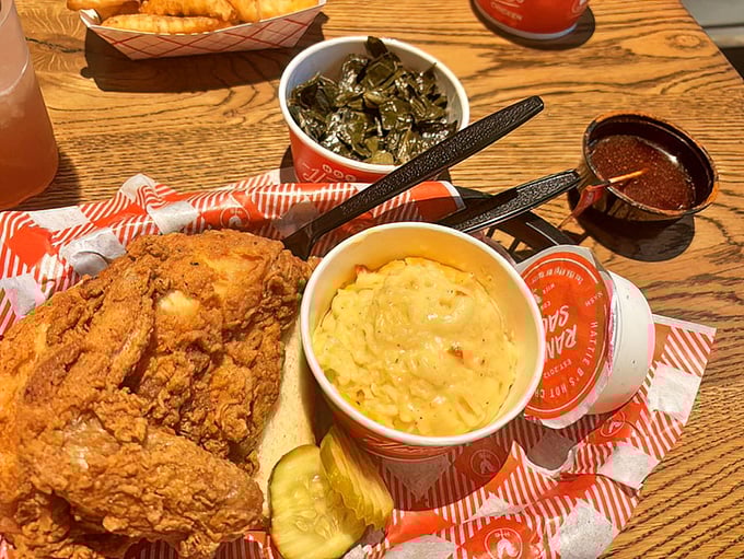 Southern poetry on a plate: crispy chicken, soul-soothing greens, and mac and cheese that makes you want to call your mama.