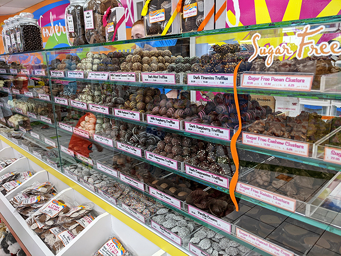 The chocolate counter – where willpower goes to surrender and "I'll just have one" becomes the day's biggest lie.