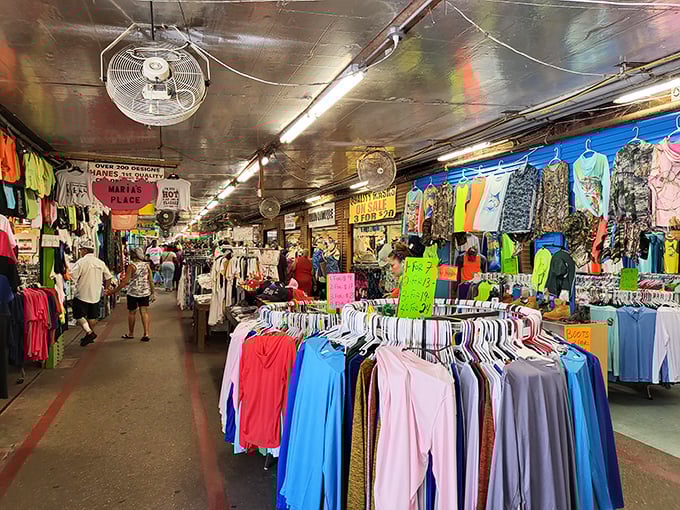 The clothing corridors stretch endlessly, a textile time machine where today's bargain might be tomorrow's vintage fashion statement.
