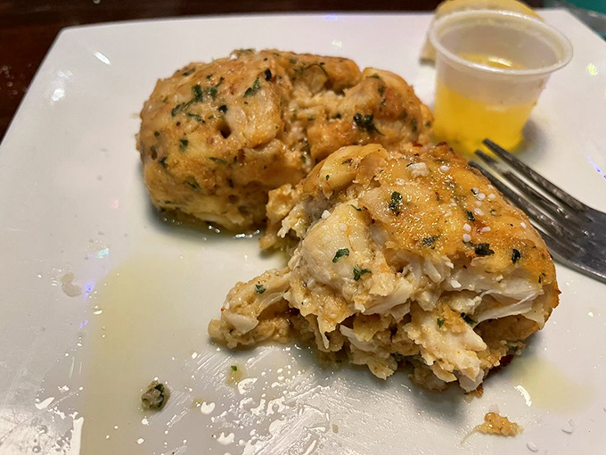 These crab cakes are what seafood dreams are made of—mostly crab, minimal filler, and perfectly golden. The fork doesn't lie.