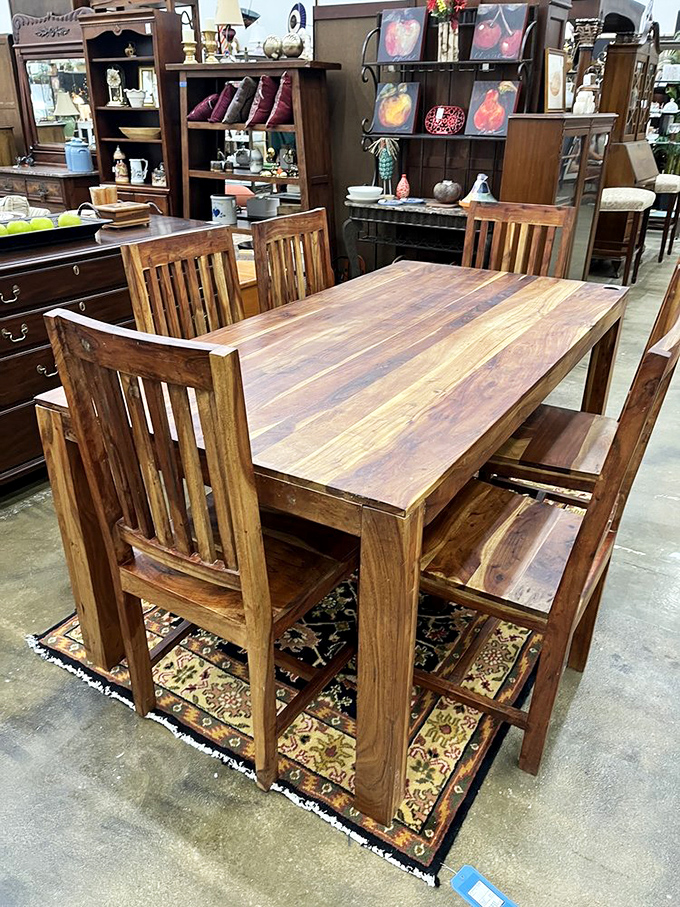 This solid wood dining set isn't just furniture—it's where your future Thanksgiving arguments and birthday celebrations are waiting to happen.