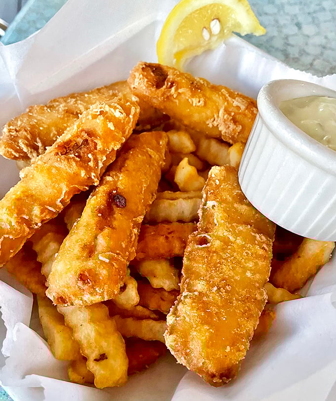 These aren't just fish and chips—they're crispy ambassadors from the sea, demanding to be dipped.