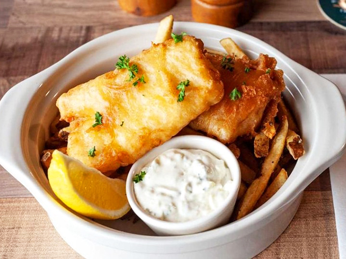 Fish and chips that would make a Dubliner homesick—golden-battered cod with a crunch you can hear across the room.