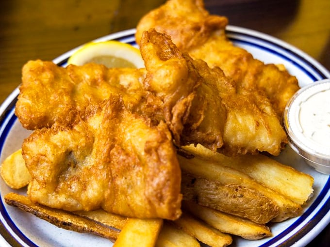 Golden, crispy, and utterly irresistible—this fish and chips plate isn't just a meal, it's the reason stretchy pants were invented.