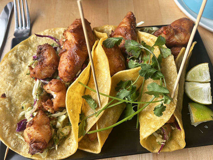 These fish tacos aren't just good—they're tell-your-friends-and-plan-your-next-visit good. Crispy, zesty perfection wrapped in hand-held happiness.