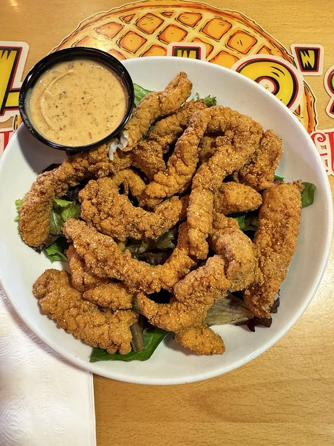 Cornmeal-crusted catfish so perfectly fried it makes you wonder if there's a Ph.D. program in crispiness that the chef graduated from with highest honors.