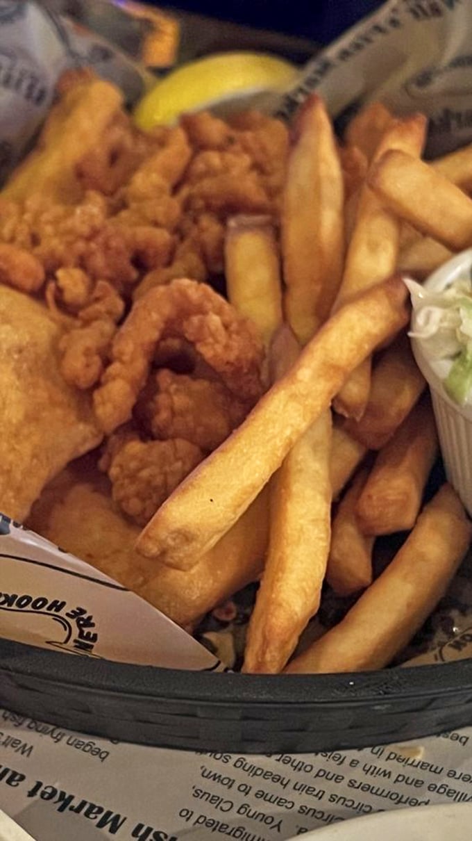 Fried seafood perfection in a basket – where crispy meets tender in that magical zone that makes you forget counting calories was ever invented.