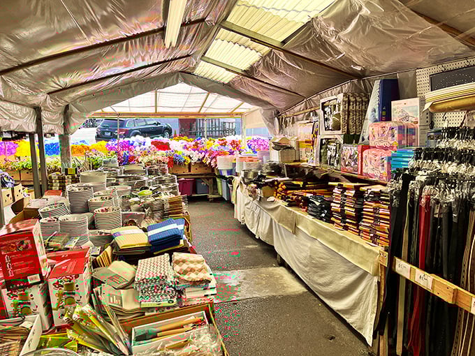 Kitchen dreams are made of this—cookware, linens, and home goods stacked to the ceiling in this covered vendor space.