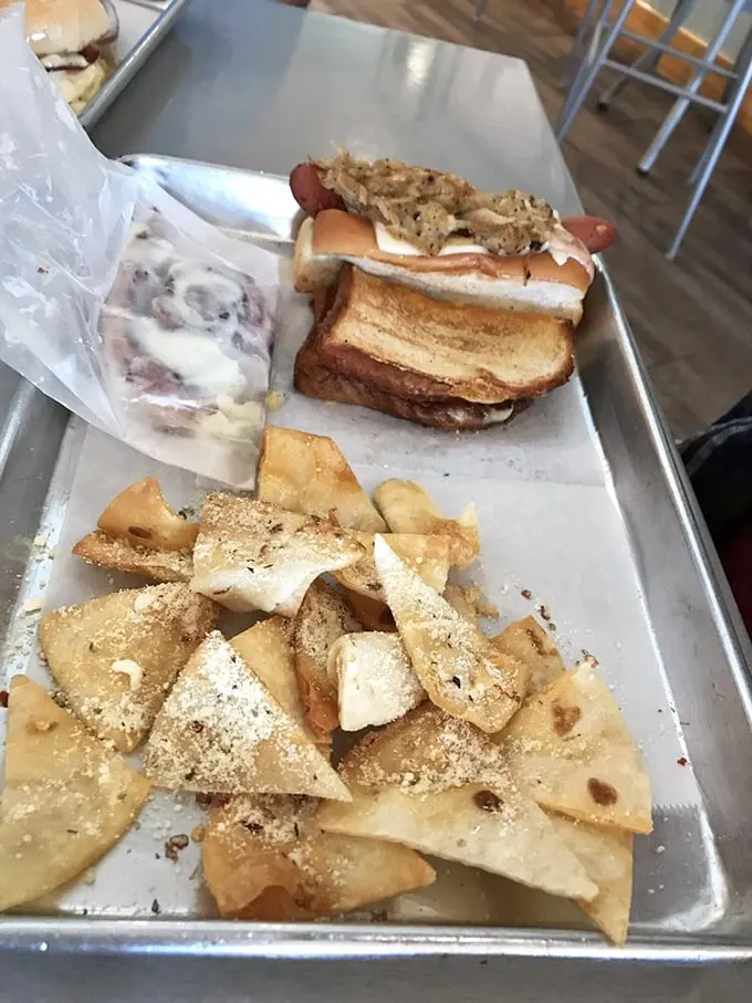 Lunch tray innovation at its finest—a sandwich that demands your full attention, paired with house-seasoned chips that refuse to play second fiddle.