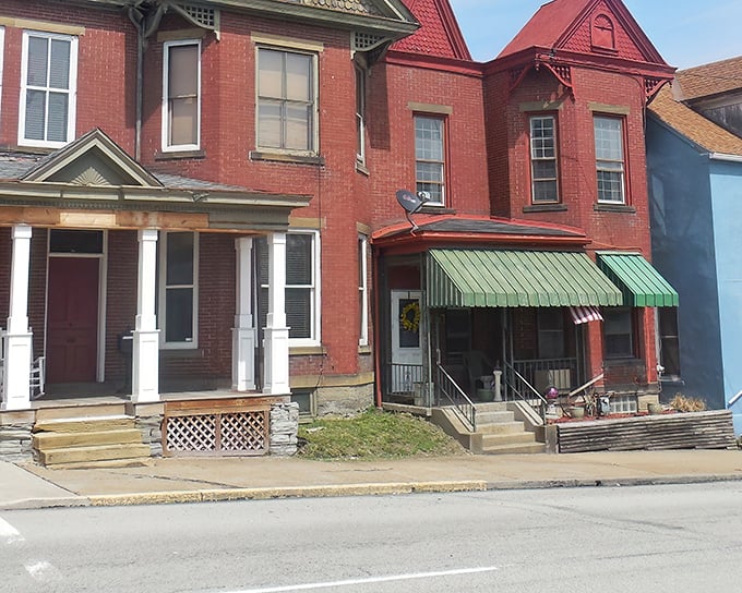 Victorian-era homes with welcoming porches and vintage awnings. The architectural equivalent of your grandmother's perfect chocolate chip cookies. 