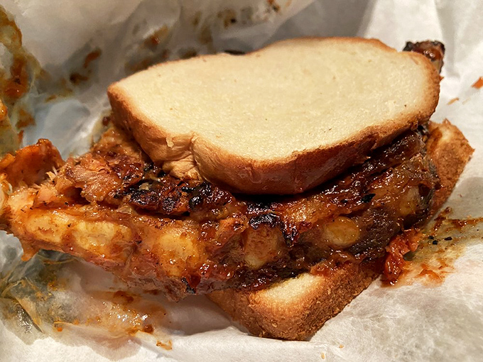 This sandwich doesn't just blur the line between meat and bread—it completely redefines the relationship in the most delicious way possible.