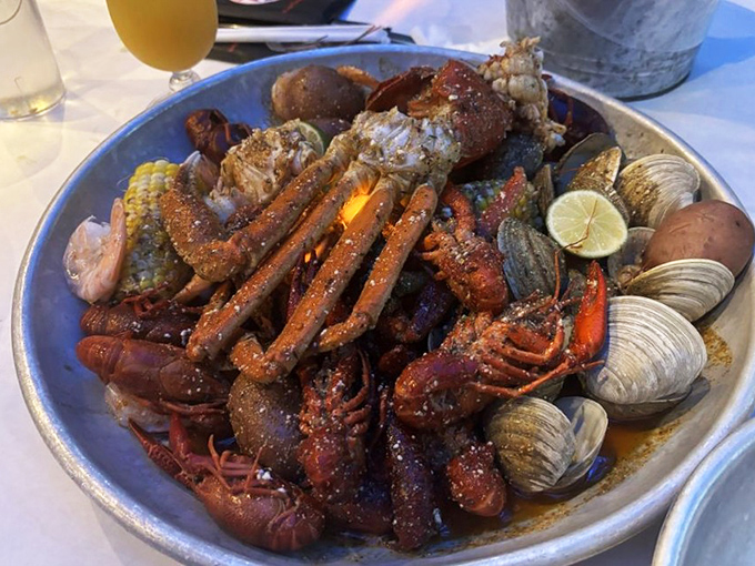 The ultimate seafood medley—where crawfish, crab legs, clams, and corn coexist in spicy harmony like a delicious underwater United Nations.