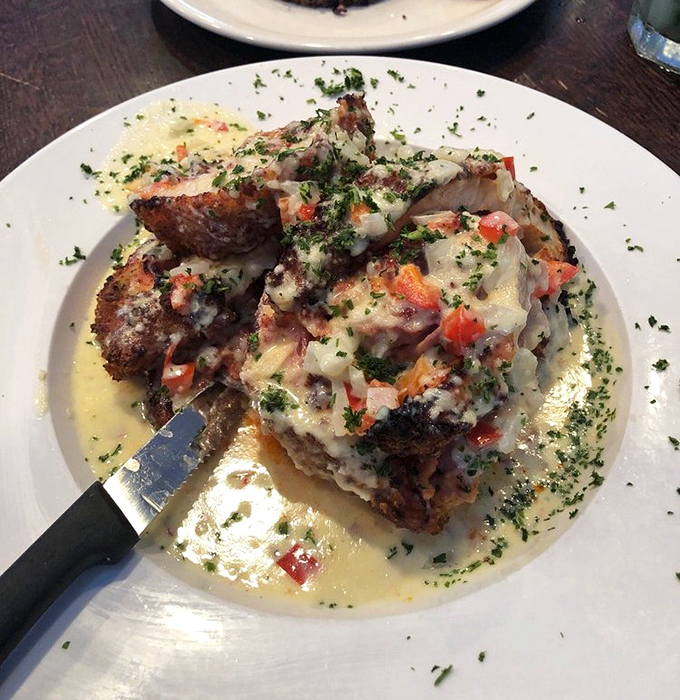 Calling this "stuffed chicken" is like calling the Louvre "a building with paintings." Cheese, sauce, and perfectly cooked protein create edible architecture.